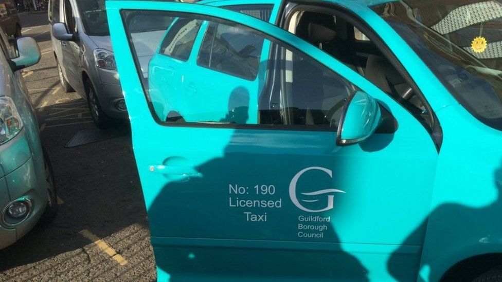 Guildford cabbies may launch legal challenge over teal taxis - BBC News
