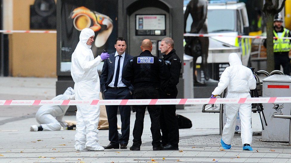 Cardiff Queen Street: Man charged with fatal stabbings - BBC News