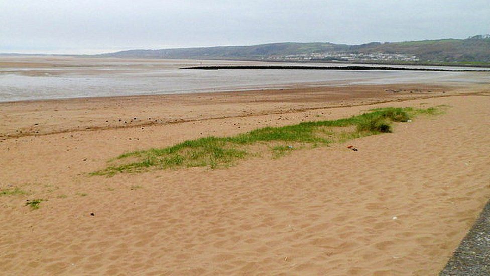 Glenn Alan Payne identified as Llanelli beach body - BBC News