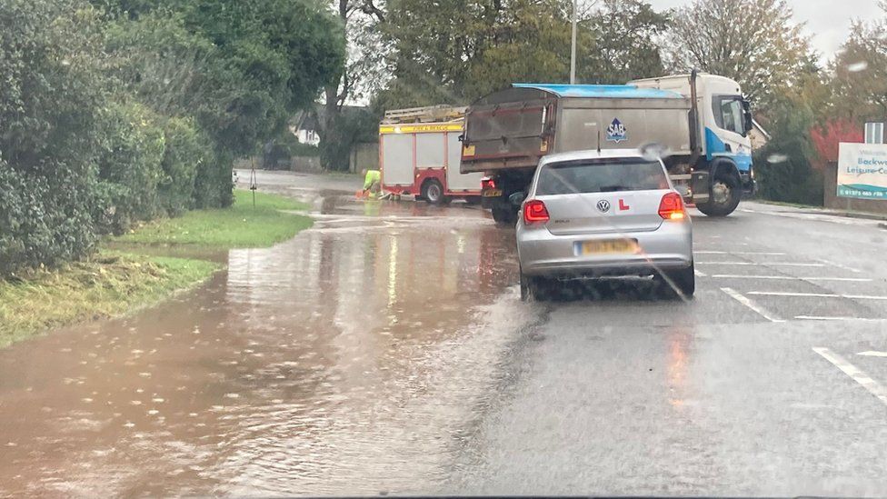 Travel disruption as heavy rain floods roads near Bristol - BBC News