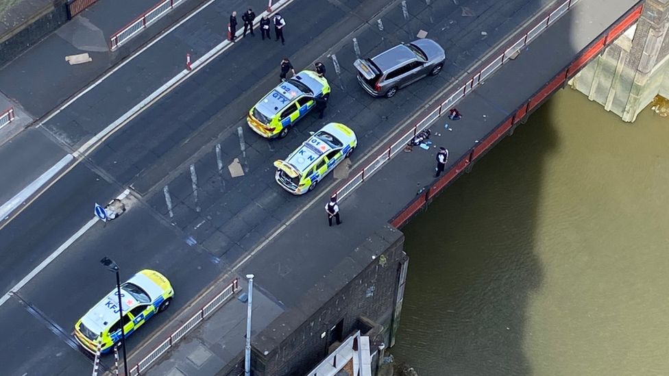 Man shot by armed police on bridge detained as investigation continues ...