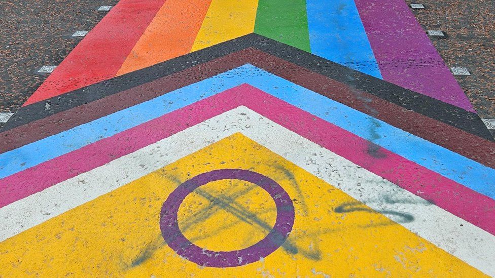 Blackpool rainbow zebra crossing defaced with graffiti - BBC News