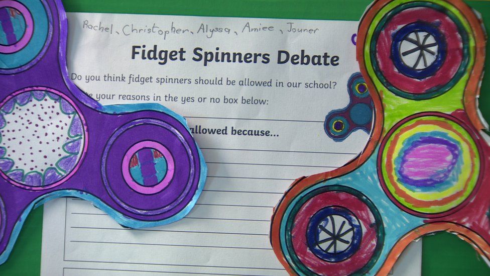 Fidget spinners aid teaching in Newtownards school - BBC News