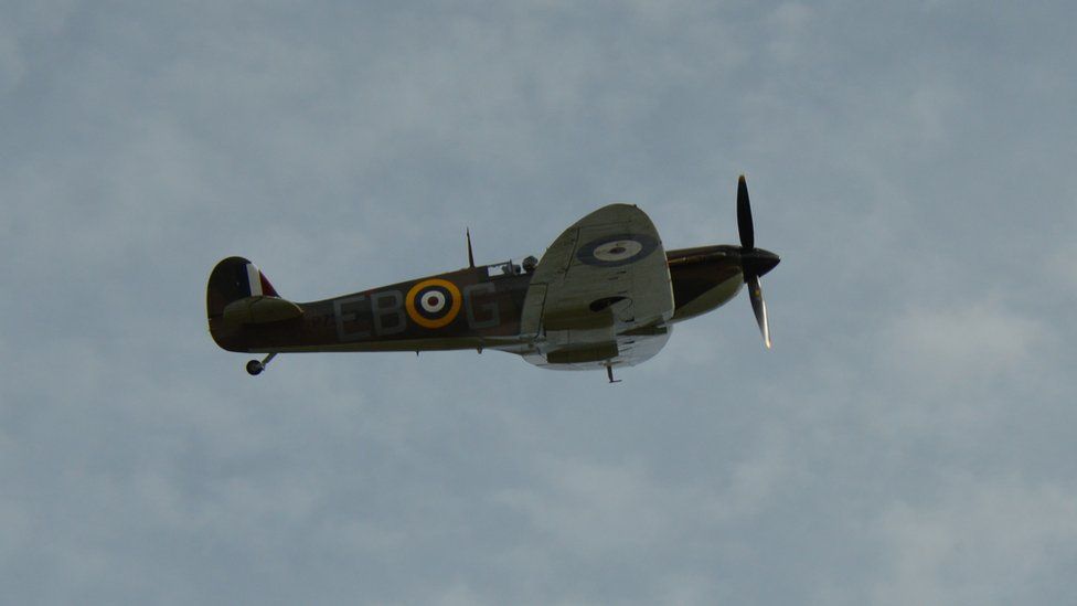 Battle of Britain Spitfire flypast at RAF Cosford - BBC News