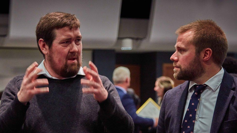 Man saved from New Brighton stormy seas meets his rescuers - BBC News