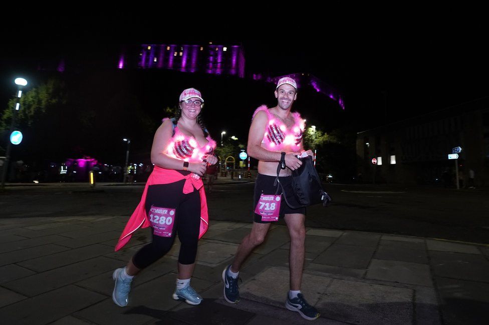 Colourful bras light up Edinburgh for Scotland MoonWalk - BBC News