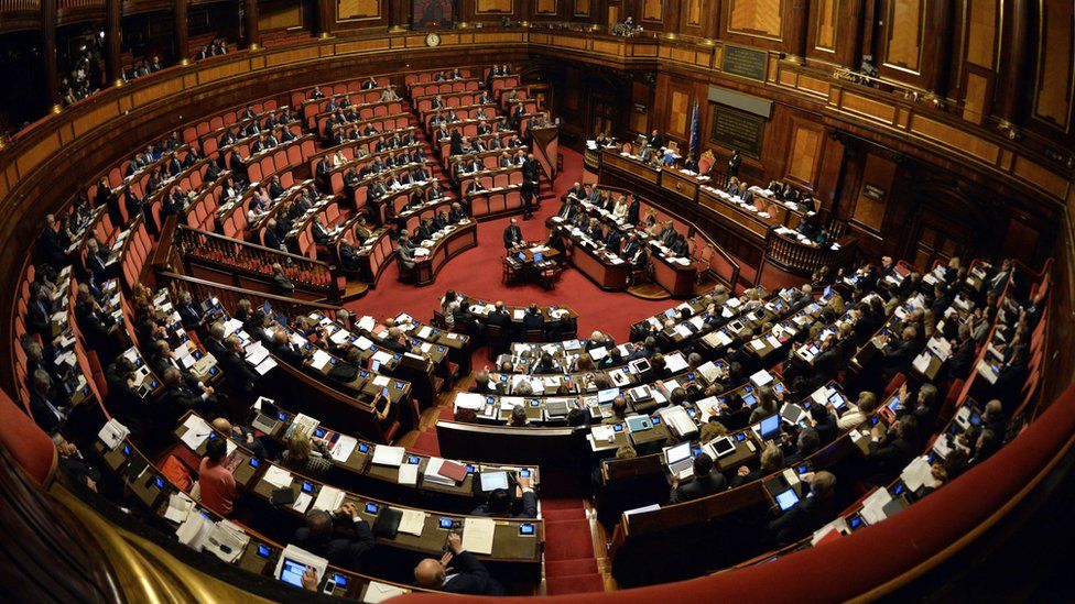 Italy senate votes to diminish its own power - BBC News