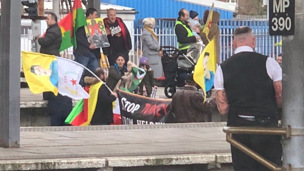 Manchester Piccadilly railway reopens after protest - BBC News