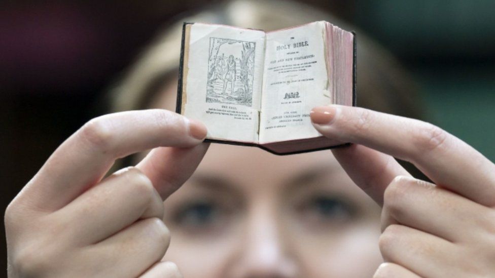Tiny bible resurfaces at Leeds library during lockdown - BBC News