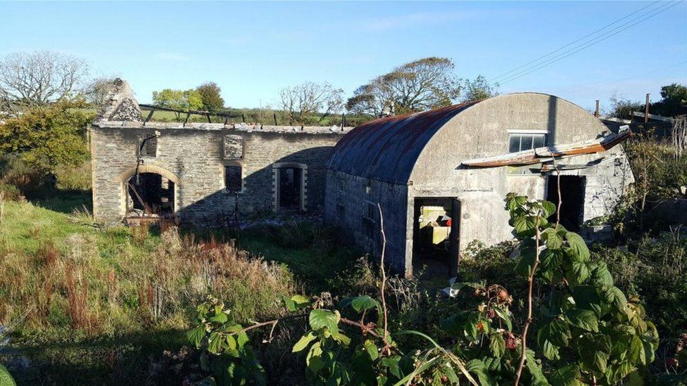 Man who burned down Whitland farmhouse jailed for five years - BBC News
