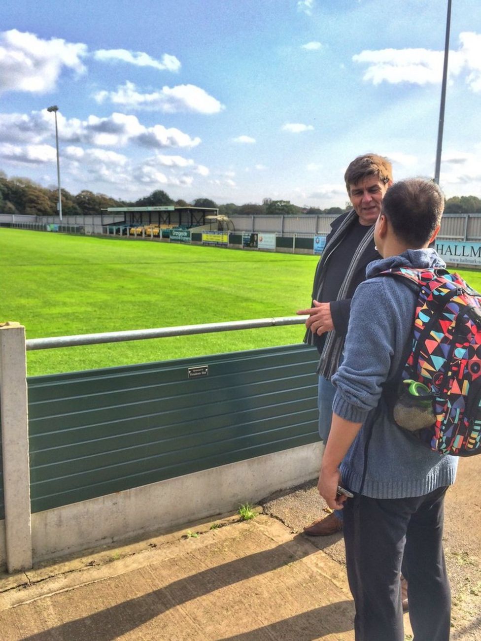 Runcorn FC Halton superfan flies family from China for visit - BBC News