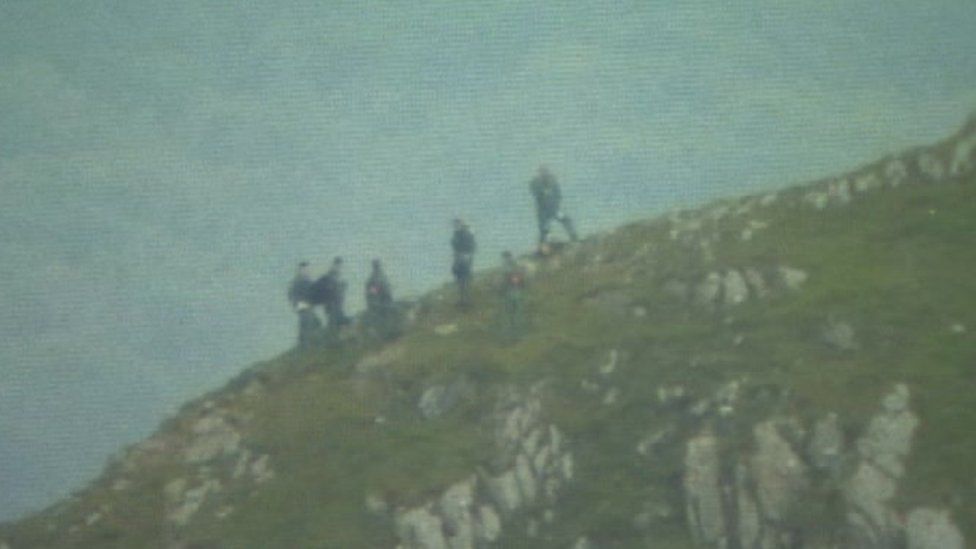 RAF helicopter fire on Snowdonia peak after technical issue - BBC News