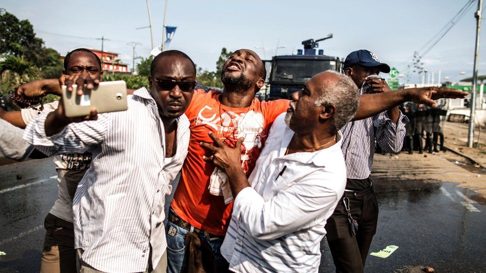 Gabon election: Security forces storm opposition HQ after disputed ...