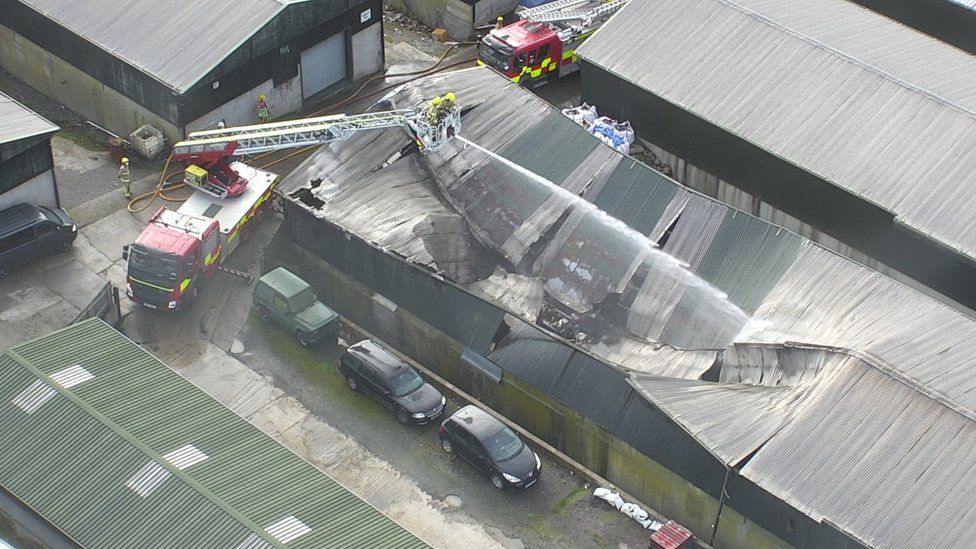 Comber: Firefighters put out accidental blaze in building - BBC News