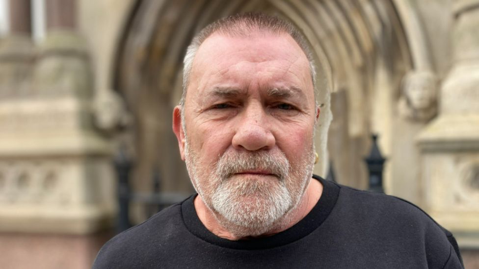 Vigil held for two men stabbed to death in Leicester - BBC News