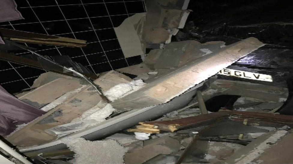 Driver banned for crashing into bathroom in Pwllheli - BBC News