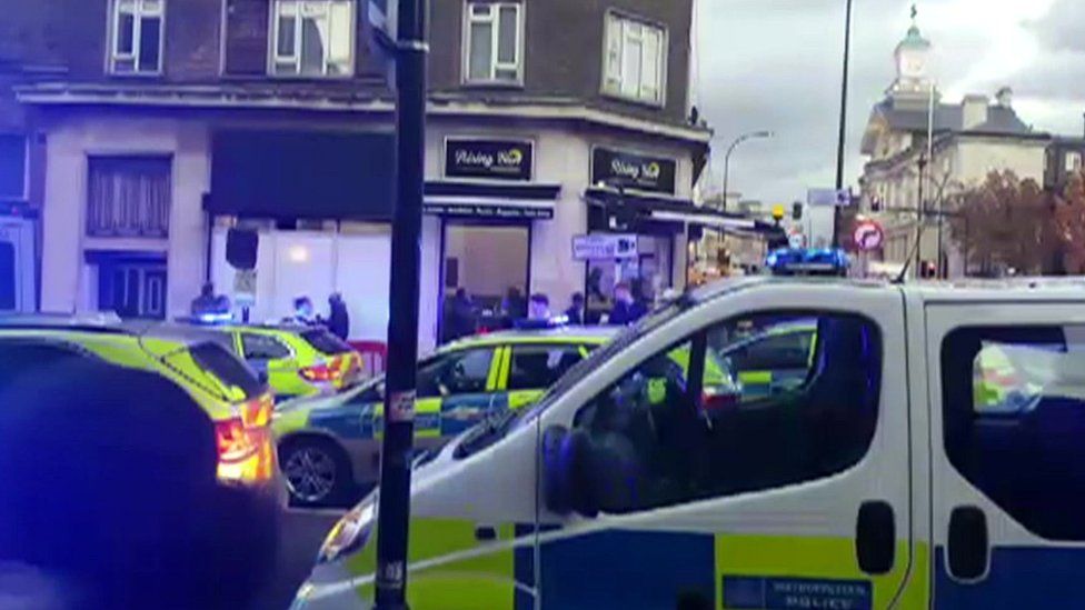 Police hurt in 'vicious' attack by pupils in New Cross - BBC News