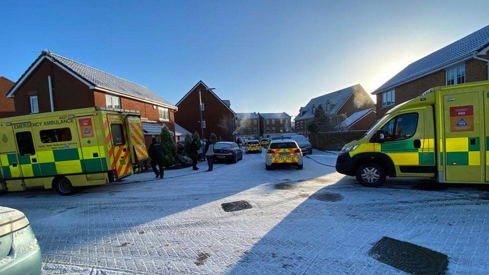 Bolton attack: Police officer headbutted and racially abused - BBC News