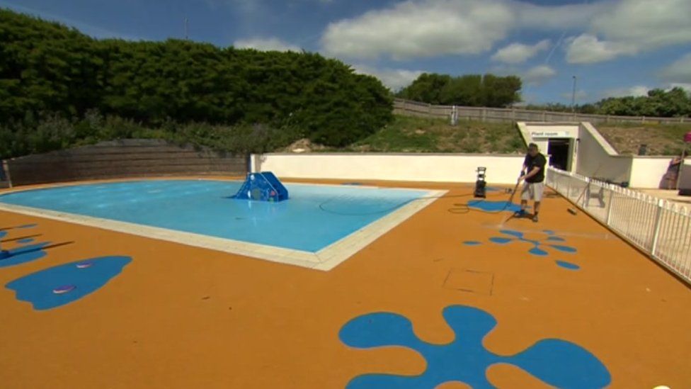 Saltdean Lido: Swimming pool reopens after seven-year revamp - BBC News