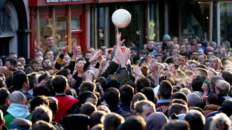 Ashbourne Shrovetide Football started by 100-year-old veteran - BBC News