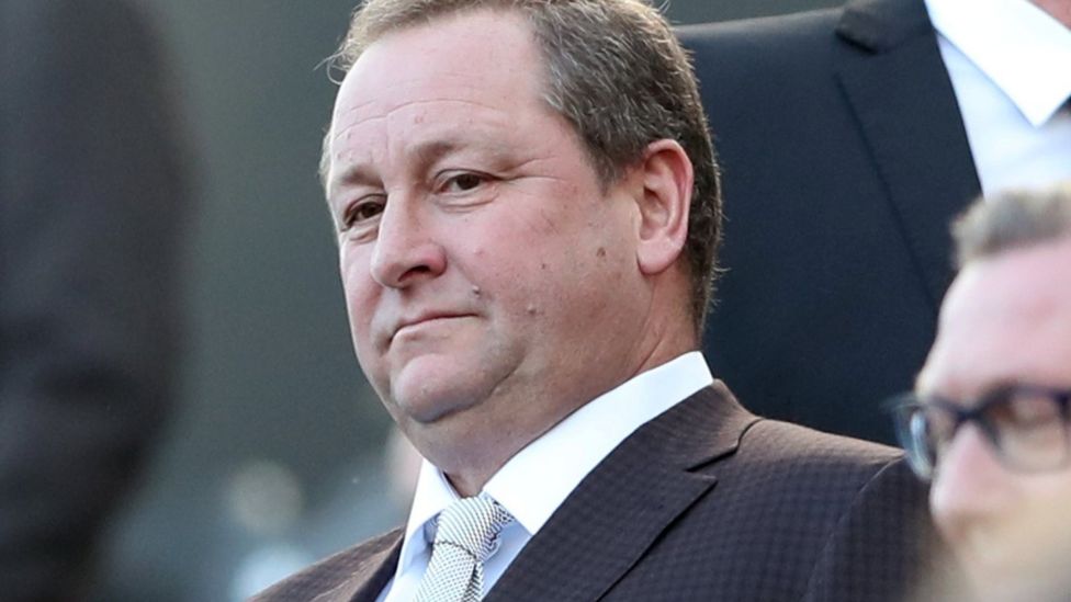 Profits slide at Mike Ashley's business - BBC News