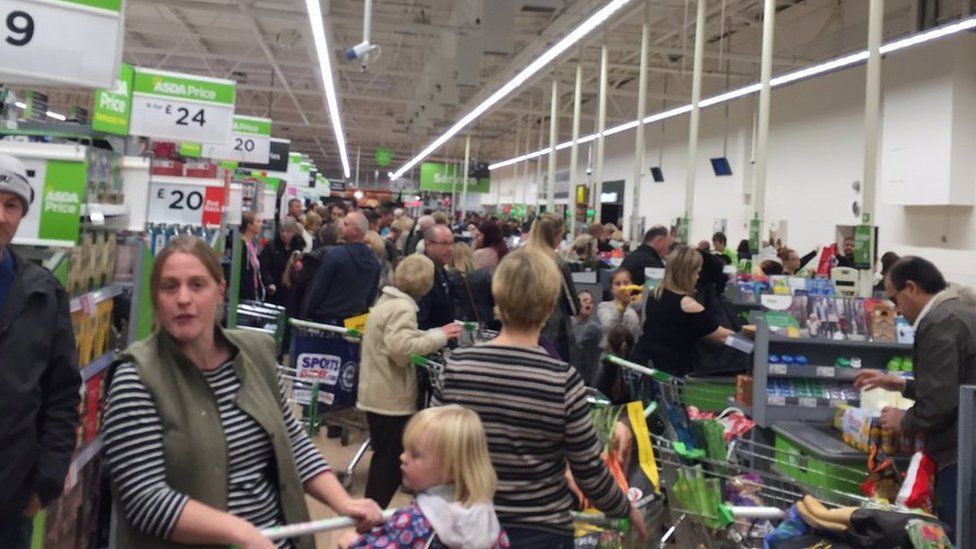 Asda card machine fault leads to queues at checkouts - BBC News