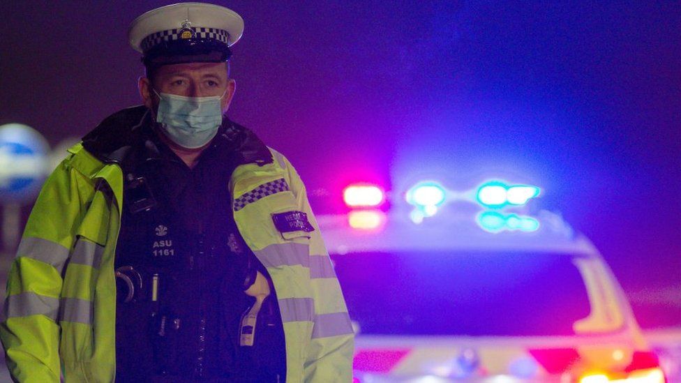 Covid: Police must be vaccinated 'as a priority' to enforce law - BBC News