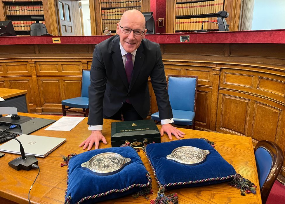 John Swinney sworn in as Scotland's first minister - BBC News