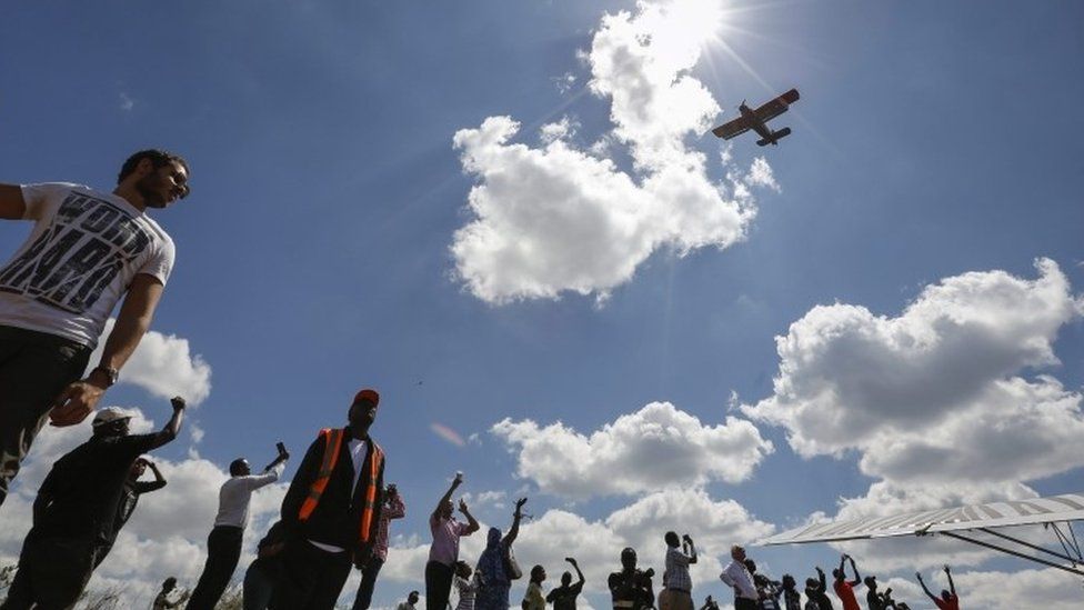 Vintage aircraft complete adventure-filled Africa rally - BBC News