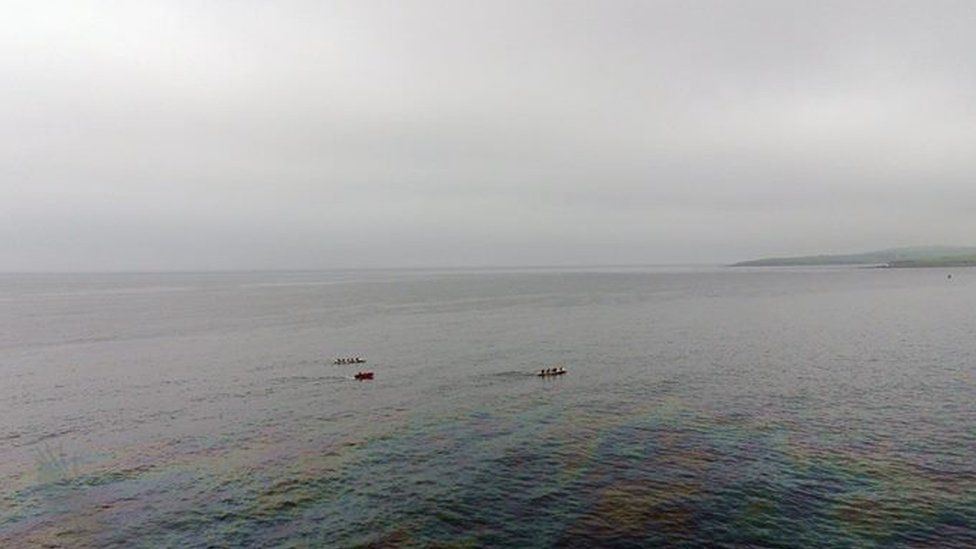 Larne diesel spill: Caterpillar NI admits it was source - BBC News