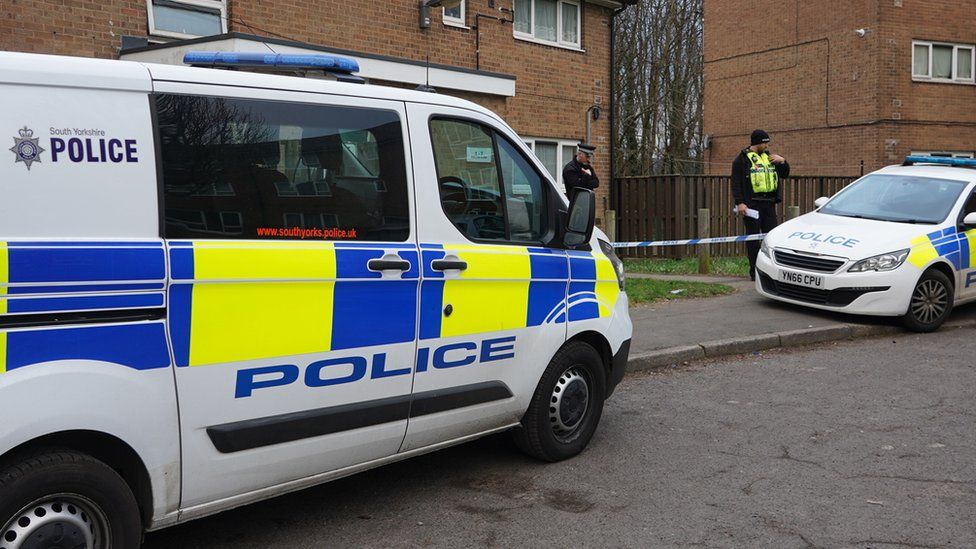 Two murder arrests after woman's body found in Sheffield flat - BBC News