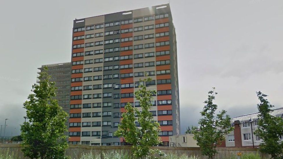 Flint flats flood as water pipe bursts at Bolingbroke Heights - BBC News