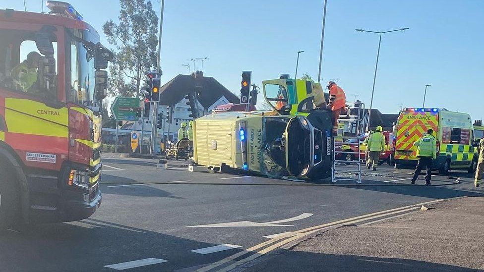 Leicester: Paramedic injured as ambulance overturns in crash - BBC News