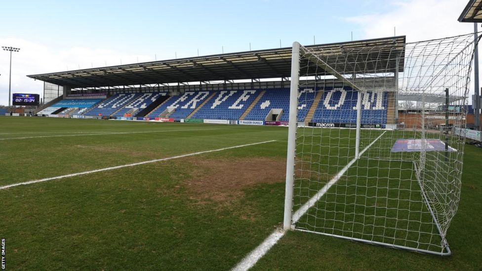 Colchester vs Swindon off because of waterlogged pitch - BBC Sport