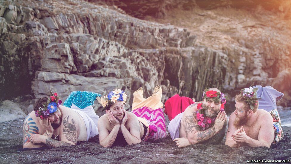 Bearded Canadians pose as 'mermen' for charity calendar - BBC News