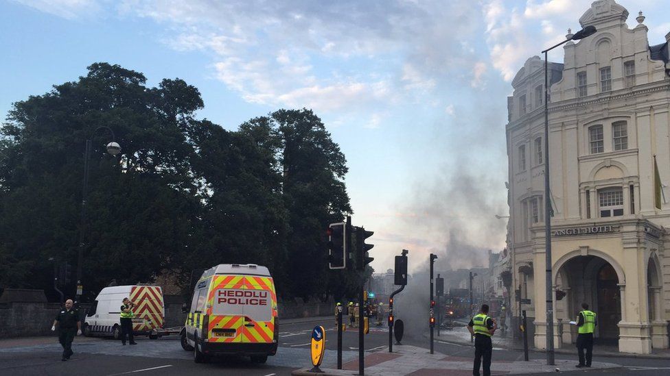 Cardiff city centre bus fire causes plumes of smoke - BBC News