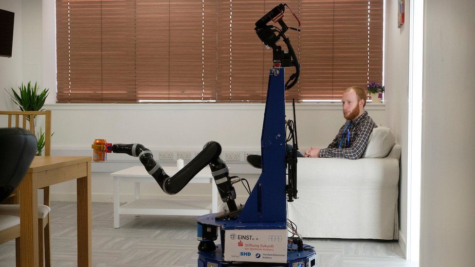 New robot technology to fight Covid care isolation - BBC News