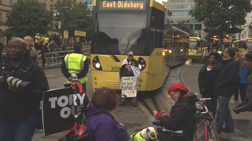 Tories greeted by large protests in Manchester - BBC News