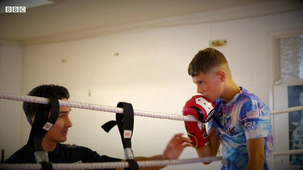 Caernarfon boxer recovering after suffering brain bleed - BBC News