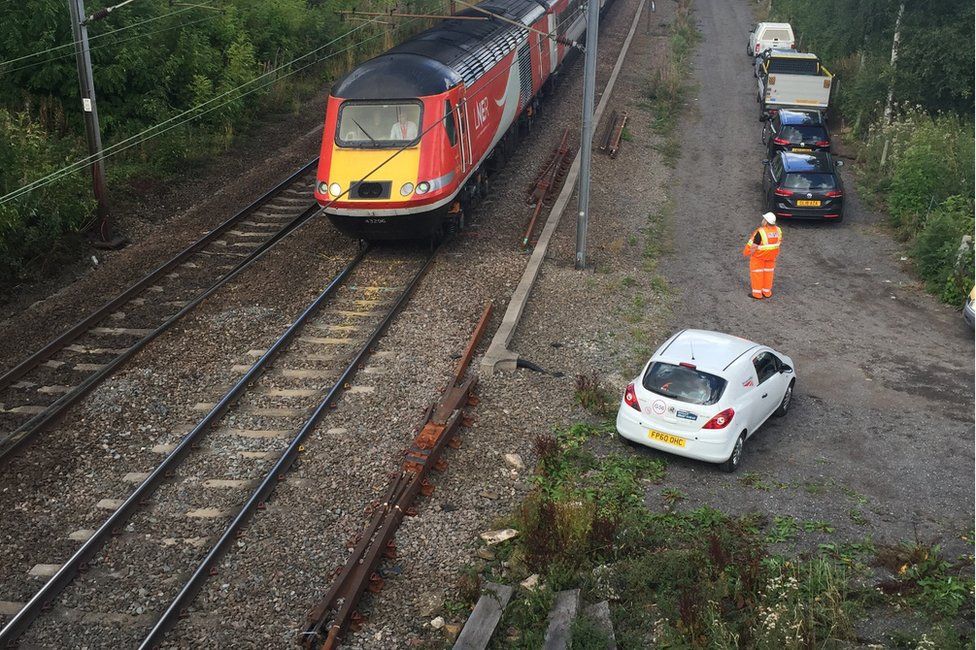 Delays as tractor ploughs over West Yorkshire rail track - BBC News