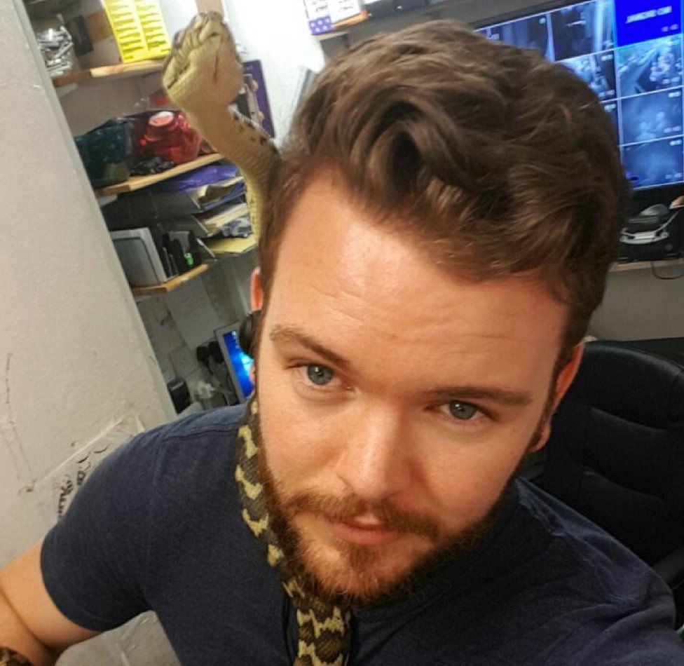 Six-foot python dumped in a Manchester city centre bin rehomed - BBC News