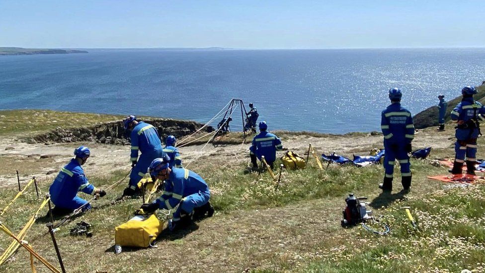 Man and dog saved in Trevose Head cliff rescue - BBC News