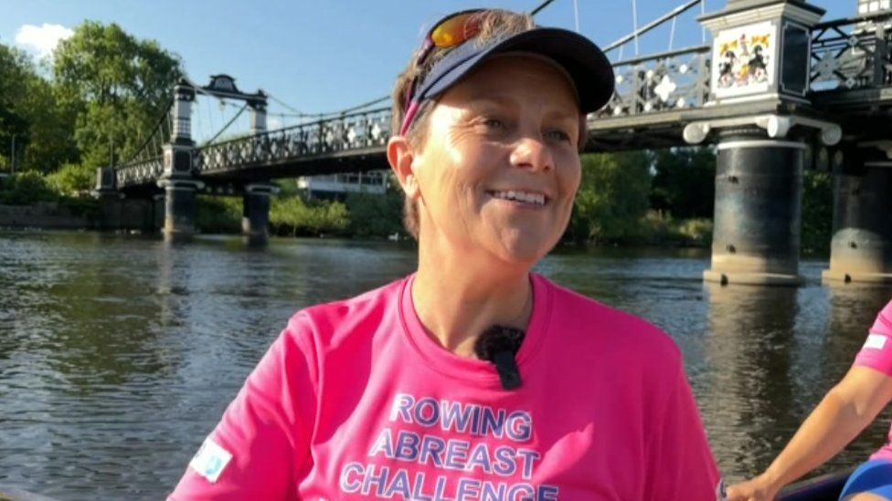 Cancer survivors in Burton Regatta row for breast cancer charity - BBC News
