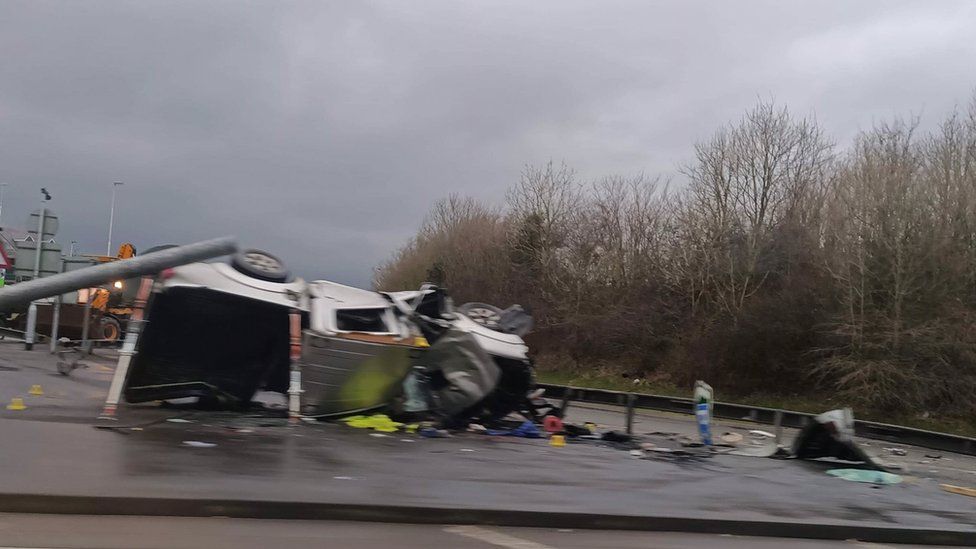 Driver hurt after car hits road sign on A40 near Carmarthen - BBC News