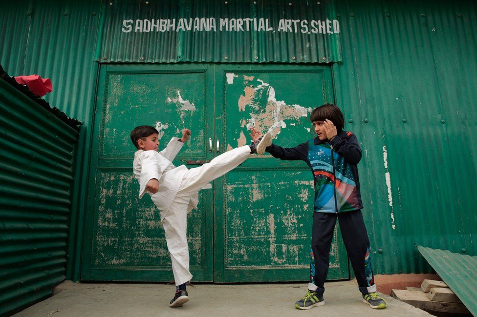 The nine-year-old Kashmiri girl who rules the kickboxing world - BBC News