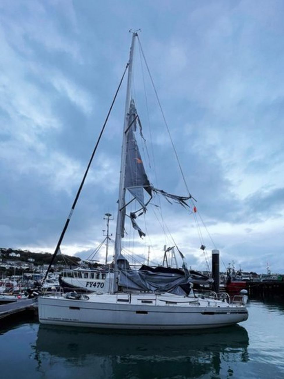 Storm Claudio: Yacht crew airlifted in 'horrendous' weather - BBC News