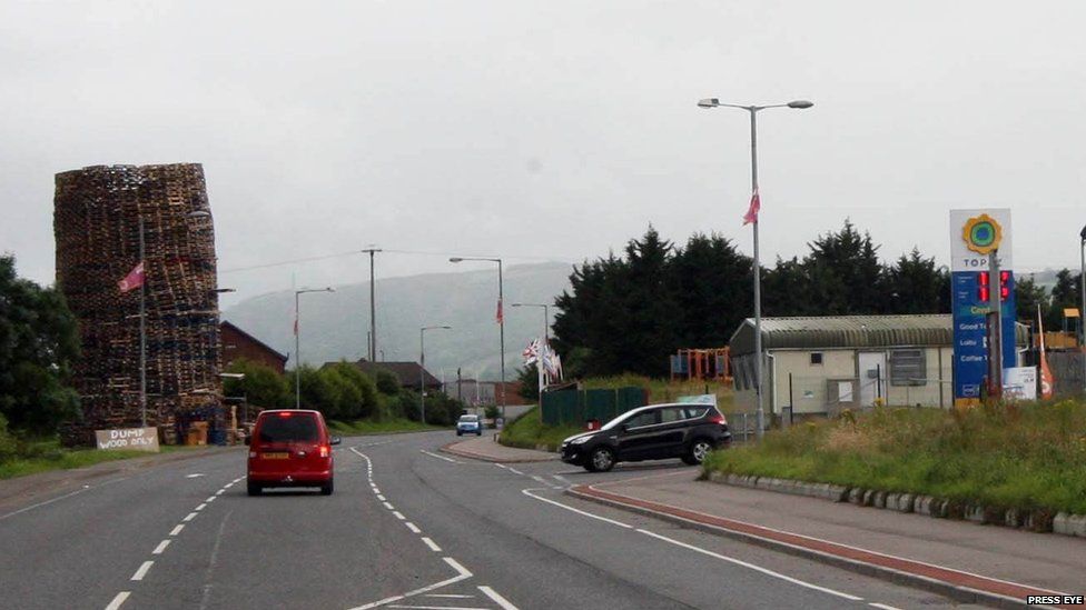 Bonfire towers near Carrickfergus petrol station - BBC News