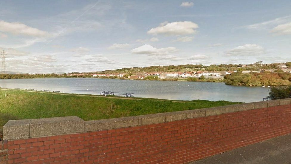 Swimmer dies after being pulled from Ormsgill Reservoir - BBC News