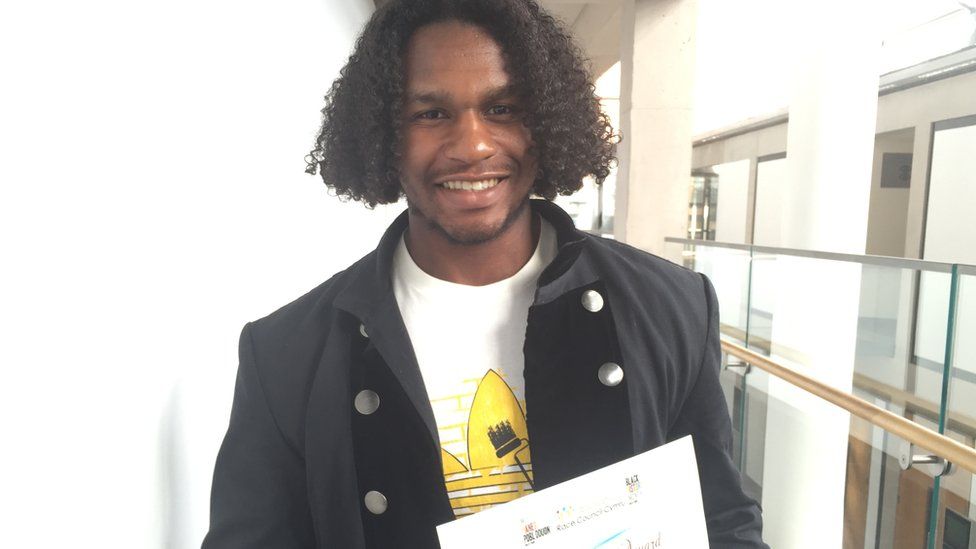 Former asylum seeker tennis player wins Black History award - BBC News