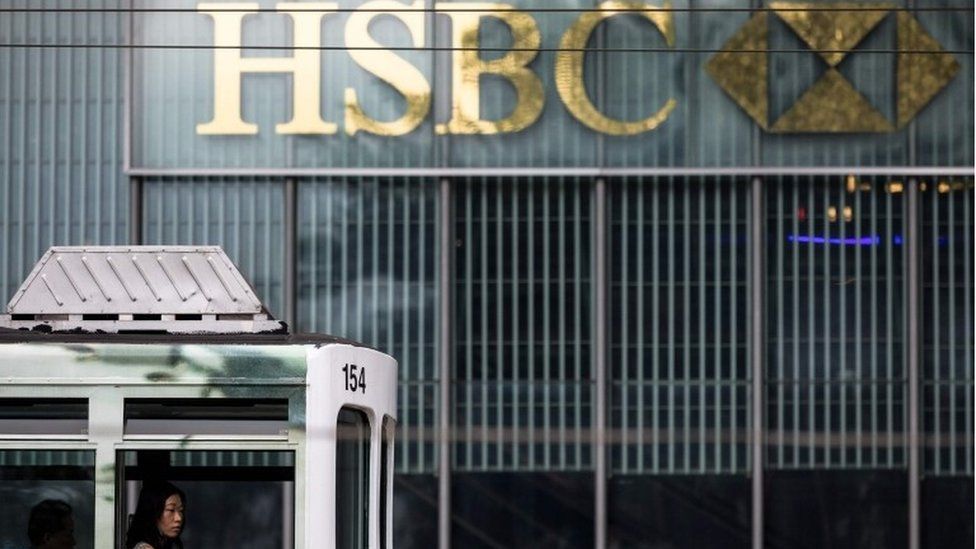 HSBC profits fall as bank bids to restore flagging revenues - BBC News